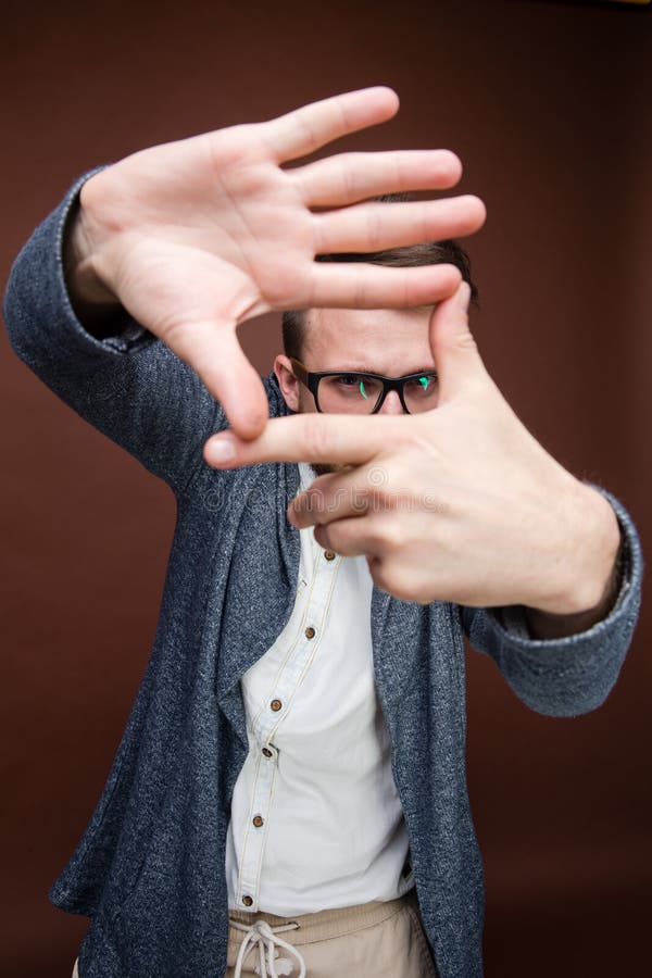 Male Making Camera from Hands Stock Photo - Image of glasses, casual ...