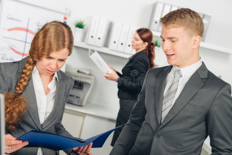 Male Manager Instructs Female Employee Stock Image - Image of manager ...