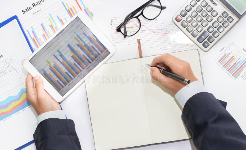 Male Manager Putting His Ideas and Writing Business Plan at Workplace ...