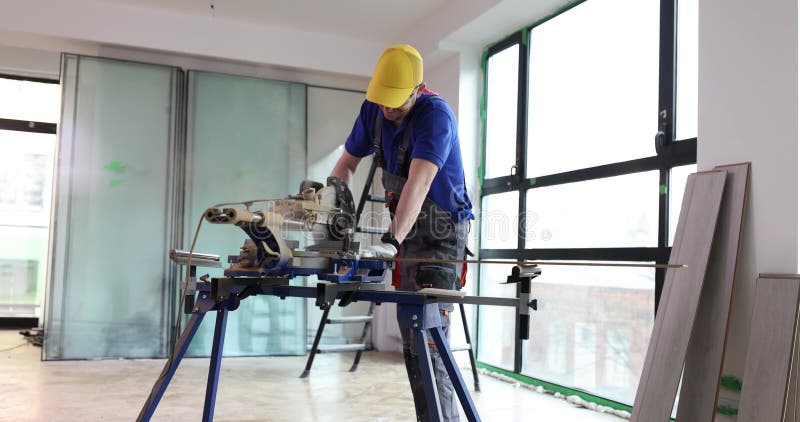 Male Master is Engaged in Sharp Laying of Laminate Stock Video - Video ...