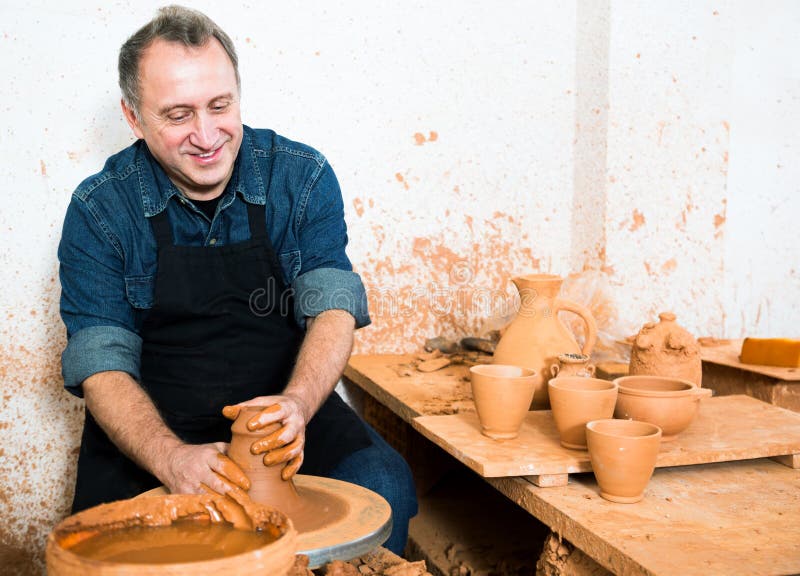 Male Master among the Pottery Stock Image - Image of happy, class: 80637867