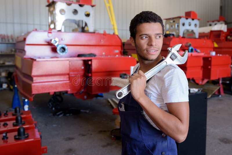 Male Mechanic Engineer Holding Tools Stock Image - Image of hand ...