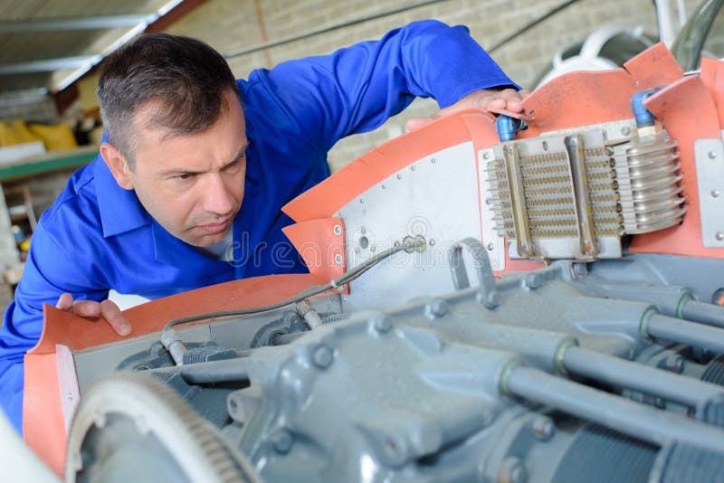 Male Mechanic Fixing Vehicle Stock Image - Image of technician ...