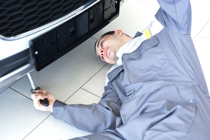 An Angry Customer Talking To a Mechanic in Auto Repair Service Stock ...