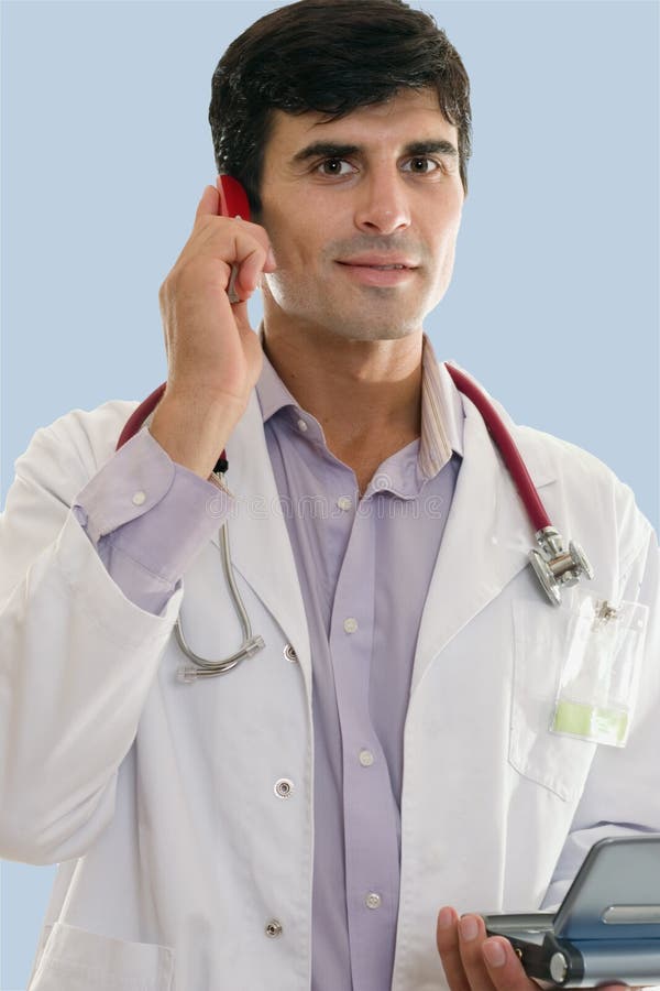 Male Medical Professional at Work Using Wireless Technologies Stock ...