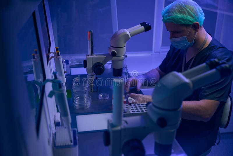 Male Microbiologist Working in Laboratory in Clinic Stock Photo - Image ...