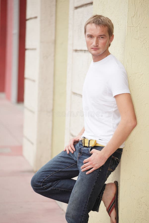 Male Model Leaning on the Wall Stock Image - Image of skinny, casual ...