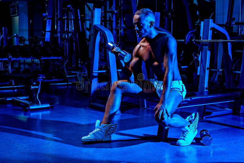 Male Model Lifting Dumbel in the Gym Stock Image - Image of athletic ...