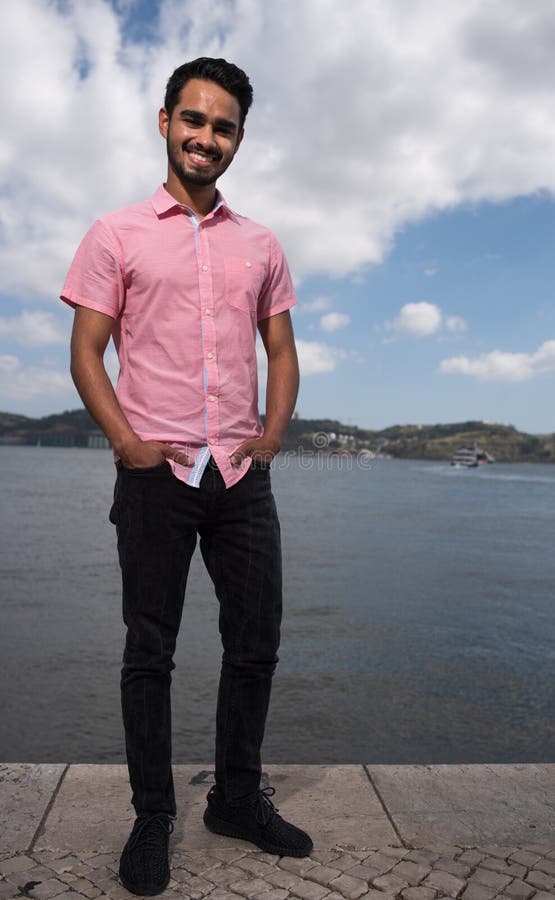 Male Model Posing in Font of River Stock Photo - Image of blue, travel ...