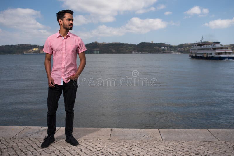 Male Model Posing in Font of River Stock Photo - Image of young ...