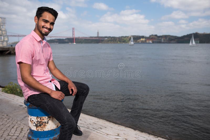 Male Model Posing in Font of River Stock Photo - Image of male, lisbon ...