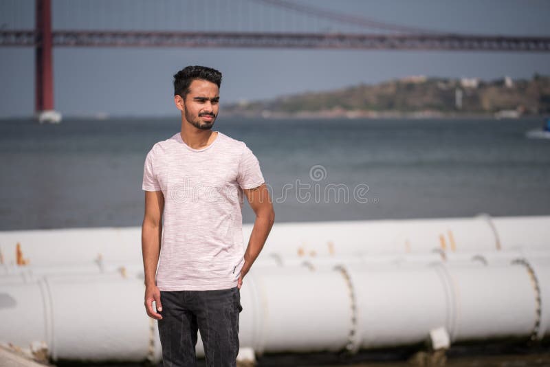 Male Model Posing in Font of River Stock Photo - Image of blue, travel ...