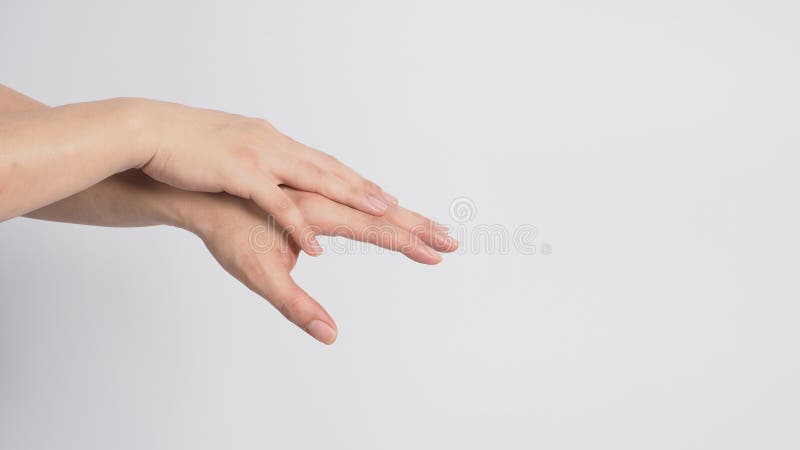 Hand is Rubbing Backs of Both Hands on White Background Stock Photo ...