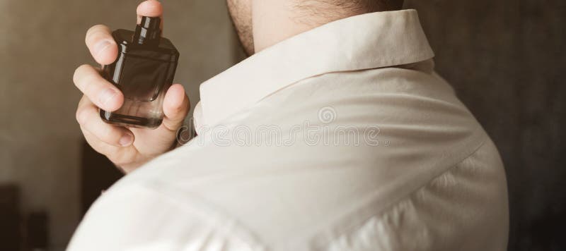 Male model using perfume stock photo. Image of caucasian - 246999772