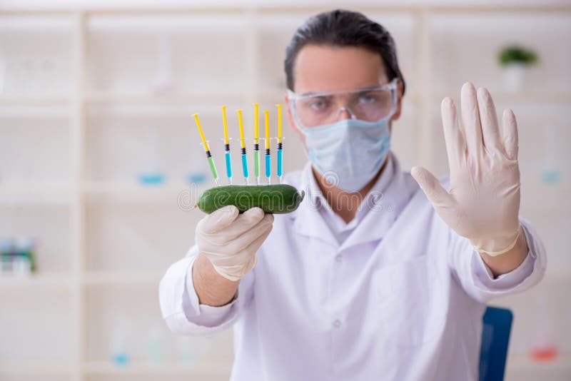 Male Nutrition Expert Testing Food Products in Lab Stock Photo - Image ...