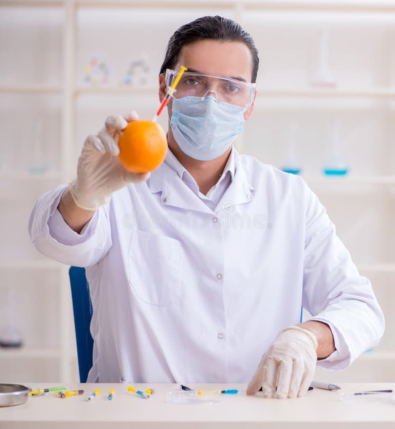 Male Nutrition Expert Testing Food Products in Lab Stock Photo - Image ...