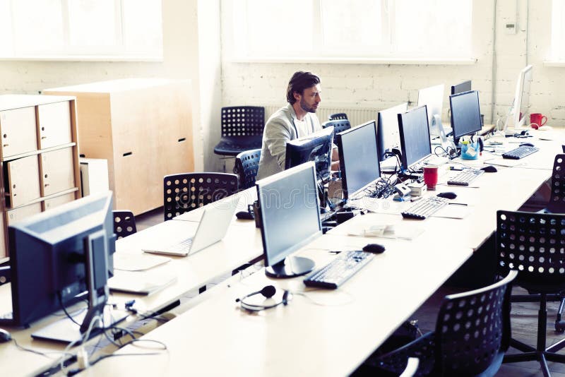 Male Office Worker Looking at Computer Screen with Data Stock Image ...