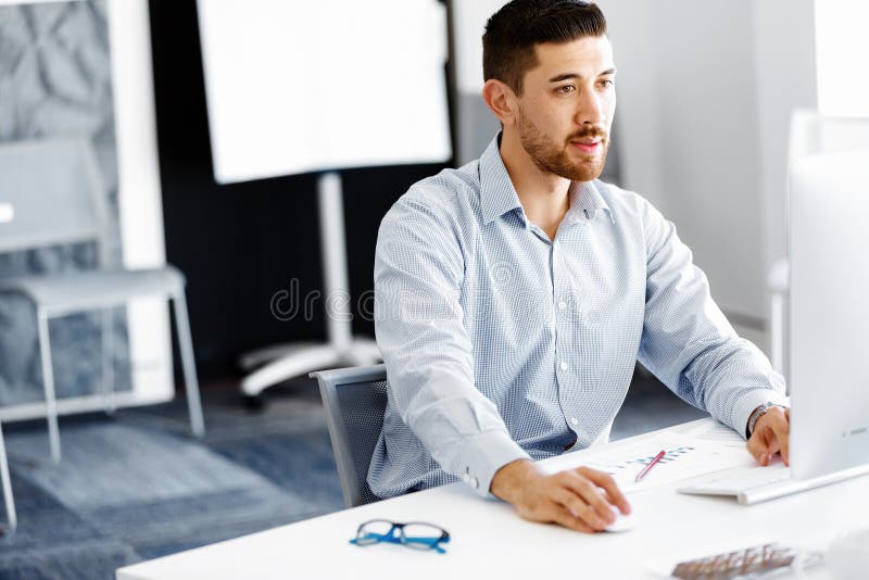 Male Office Worker Sitting at Desk Stock Image - Image of caucasian ...