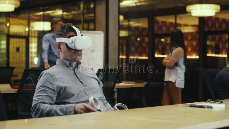 Male Office Worker Wearing VR Headset Stock Footage - Video of work ...