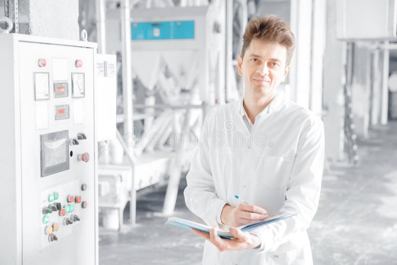 Male Operator Engineer Performs Process Production Line from Control ...