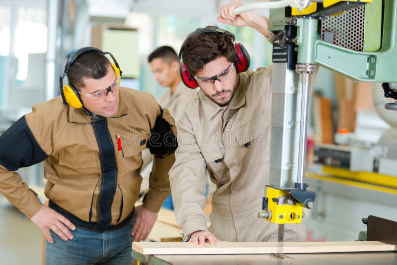 Male Operator Using Milling Machine for Cutting Wood Stock Photo ...