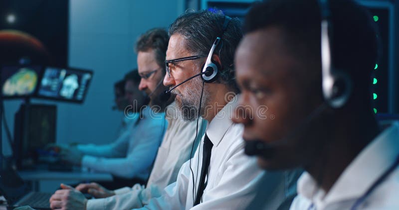 Male Operators Working in Control Center Stock Image - Image of control ...