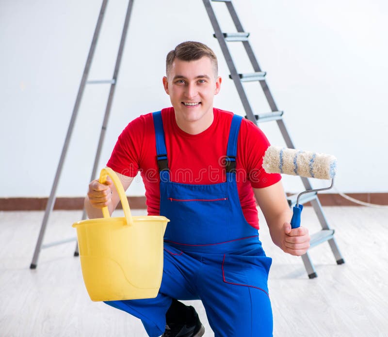 Male Painter Preparing for Painting Job at Construction Site Stock ...