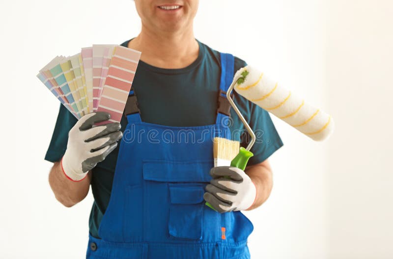 Male Painter in Uniform with Color Palette Samples, Brush and Roller ...