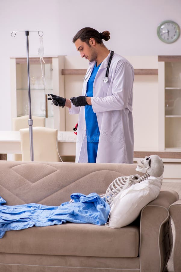 Young Male Paramedic Visiting Skeleton Patient Stock Photo - Image of ...