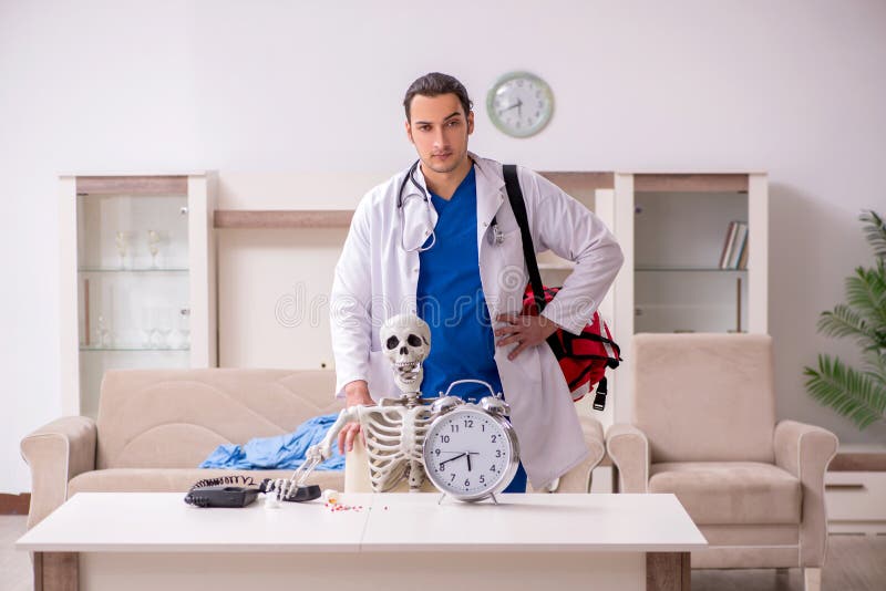 Young Male Paramedic Visiting Skeleton Patient Stock Image - Image of ...