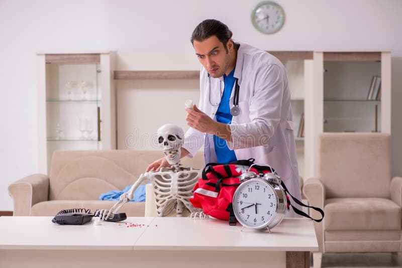 Young Male Paramedic Visiting Skeleton Patient Stock Photo - Image of ...