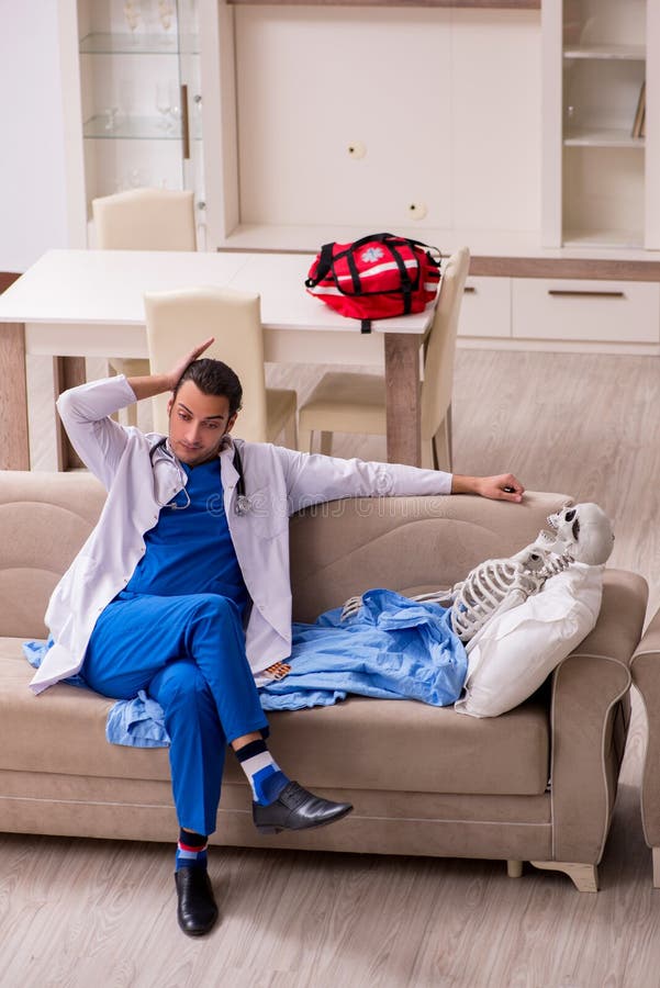 Young Male Paramedic Visiting Skeleton Patient Stock Image - Image of ...