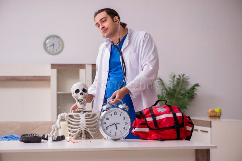 Young Male Paramedic Visiting Skeleton Patient Stock Photo - Image of ...