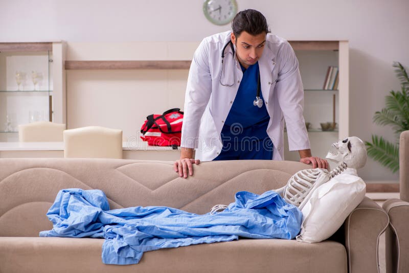 Young Male Paramedic Visiting Skeleton Patient Stock Image - Image of ...