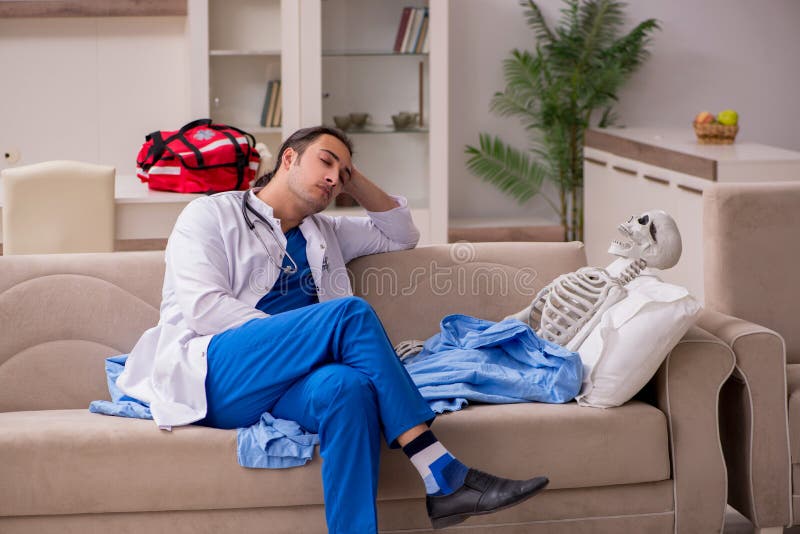 Young Male Paramedic Visiting Skeleton Patient Stock Image - Image of ...