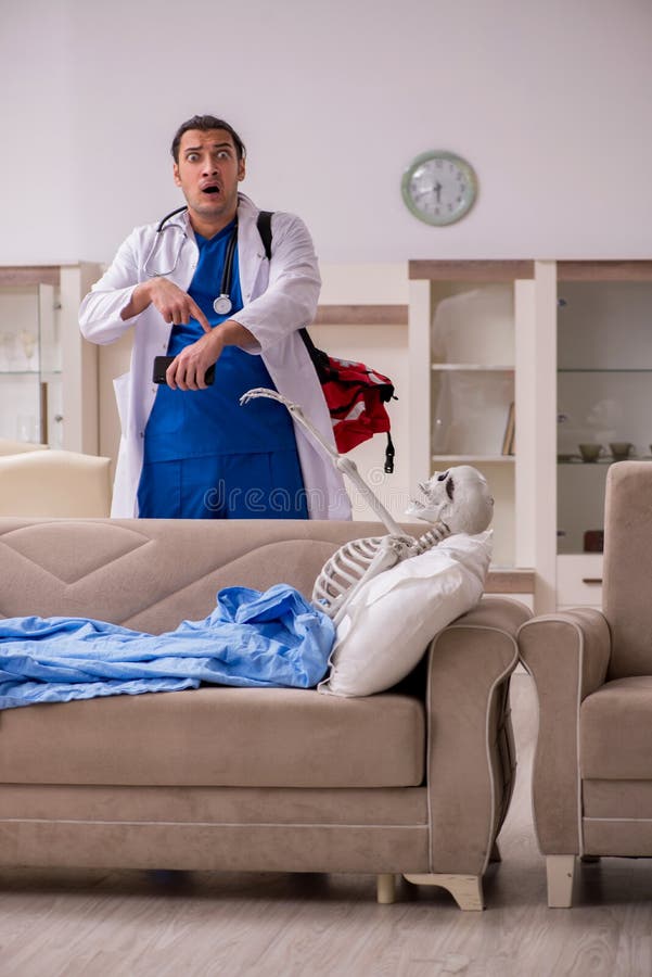 Young Male Paramedic Visiting Skeleton Patient Stock Image - Image of ...