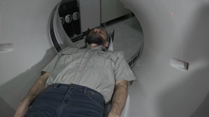 Male Patient on the Ct or Mri Scanner Machine during X-Ray Process ...