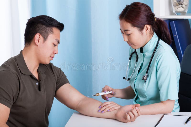 Male Patient during Injection Stock Image - Image of physician ...