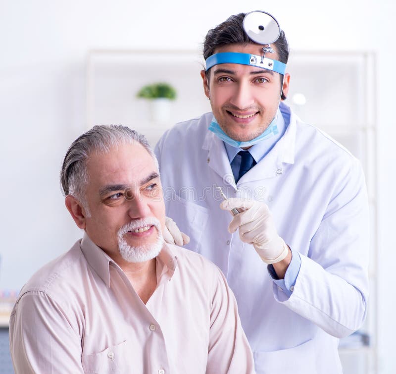 Male Patient Visiting Doctor Otolaryngologist Stock Photo - Image of ...