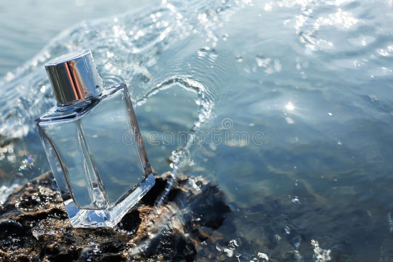 Perfume Bottle in Water Splashes Stock Photo - Image of style ...