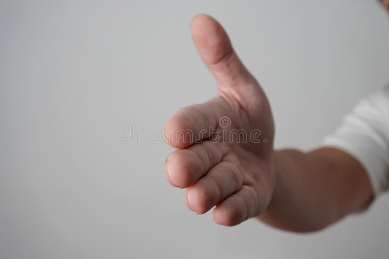 Male Person Offering Hand Shake, Over Grey Stock Photo - Image of ...