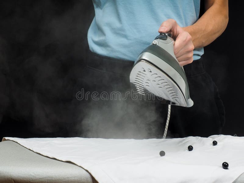 Male Person Using Steaming Hot Iron Stock Photos - Free & Royalty-Free ...