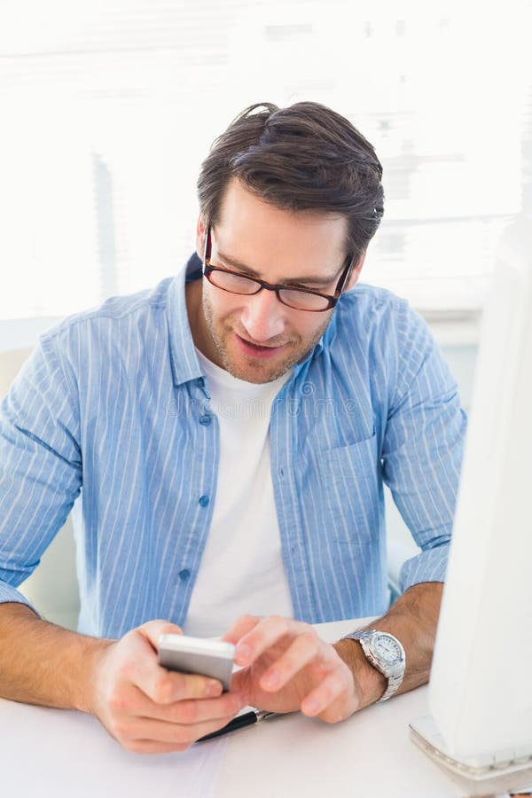 Male Photo Editor Working on Computer in a Bright Office Stock Photo ...