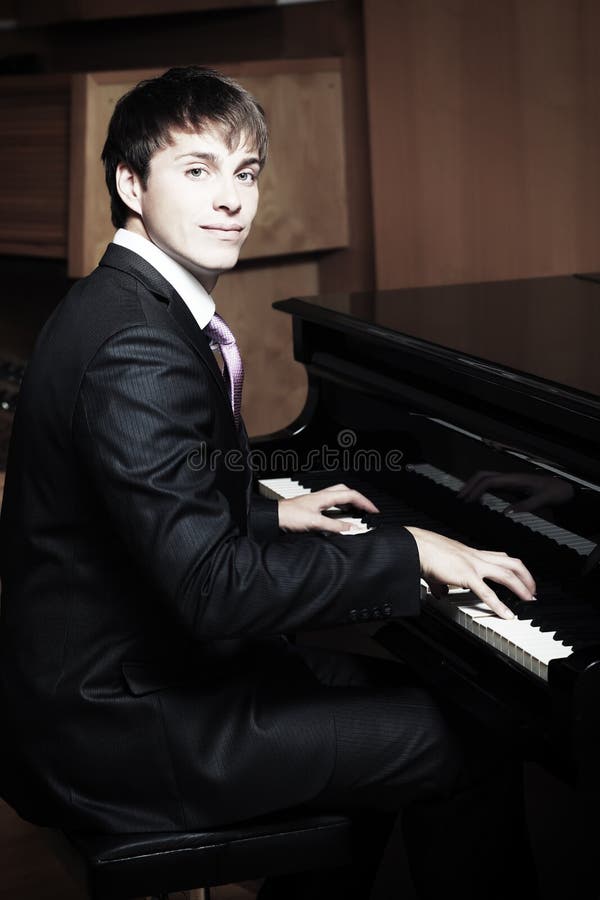 Man with piano stock photo. Image of classical, pianist - 25101638