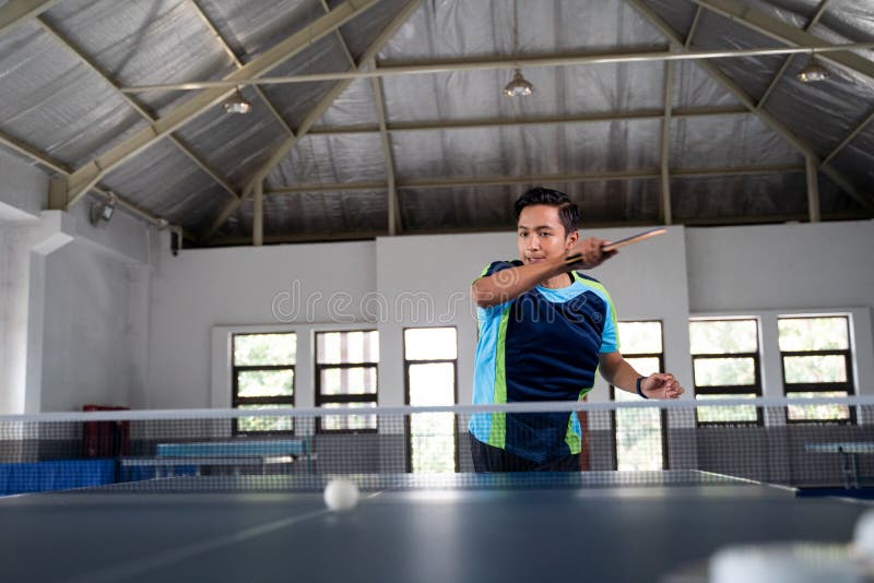 Male Ping Pong Athlete Hitting Forehand Ball Stock Image - Image of ...