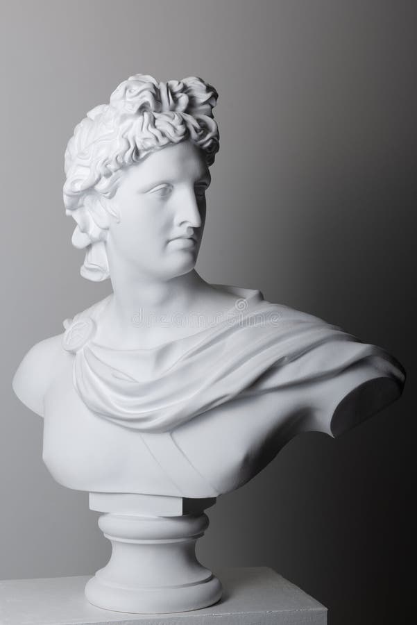 Male Plaster Statue Head in Studio Over Gray Background Stock Photo ...