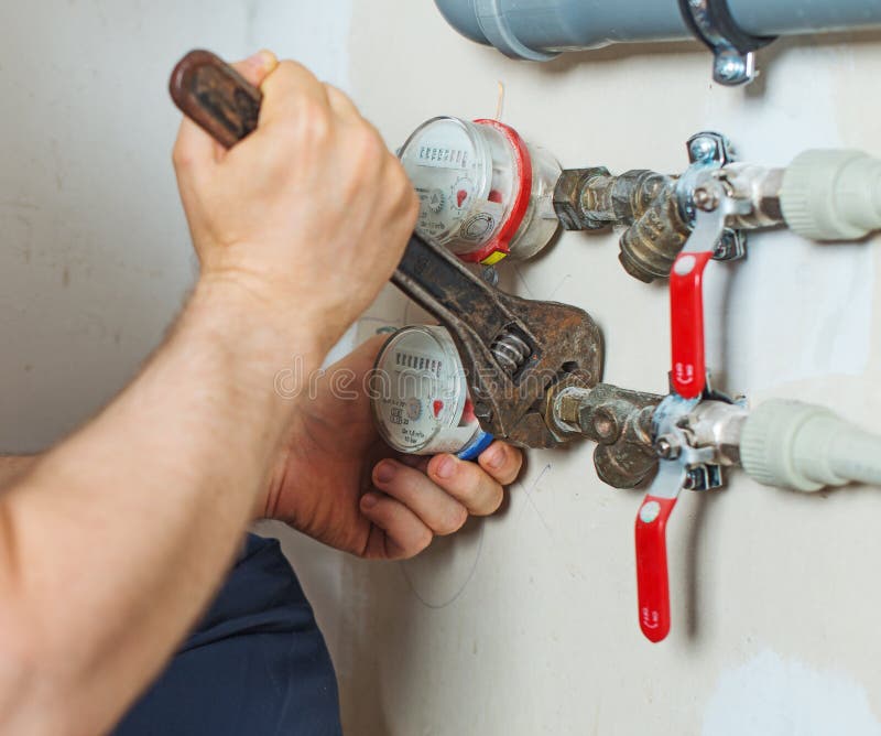 Male Plumber Fixing Water Meter. Stock Image - Image of male, builder ...