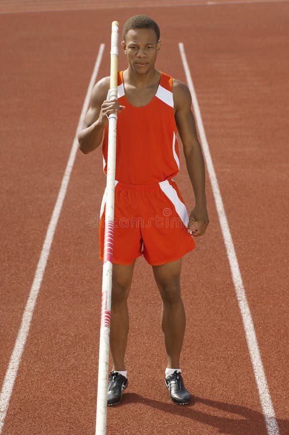 Male Pole Vaulter Holding Pole Stock Photo - Image of pole, person ...