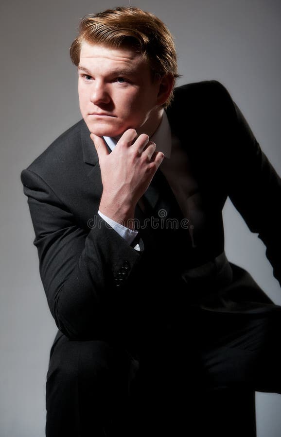 Male posing on bar stool stock photo. Image of model - 22666842