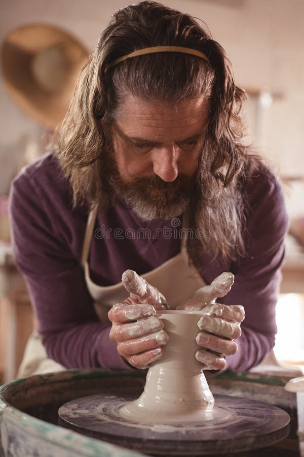Male potter making pot stock image. Image of adult, industry - 75201933